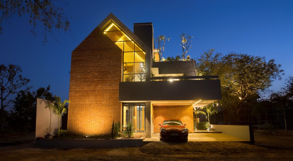 An Exposed Brick Front Elevation Gives the Villa an Evergreen Look ...