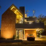 An Exposed Brick Front Elevation Gives the Villa an Evergreen Look ...