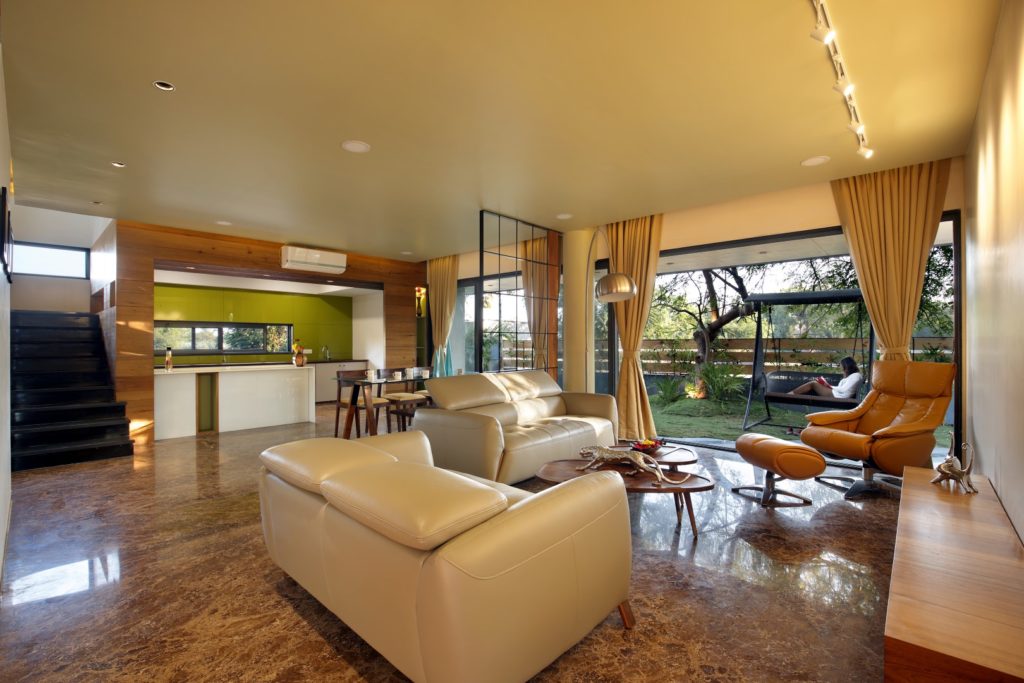 An Exposed Brick Front Elevation Gives the Villa an Evergreen Look ...