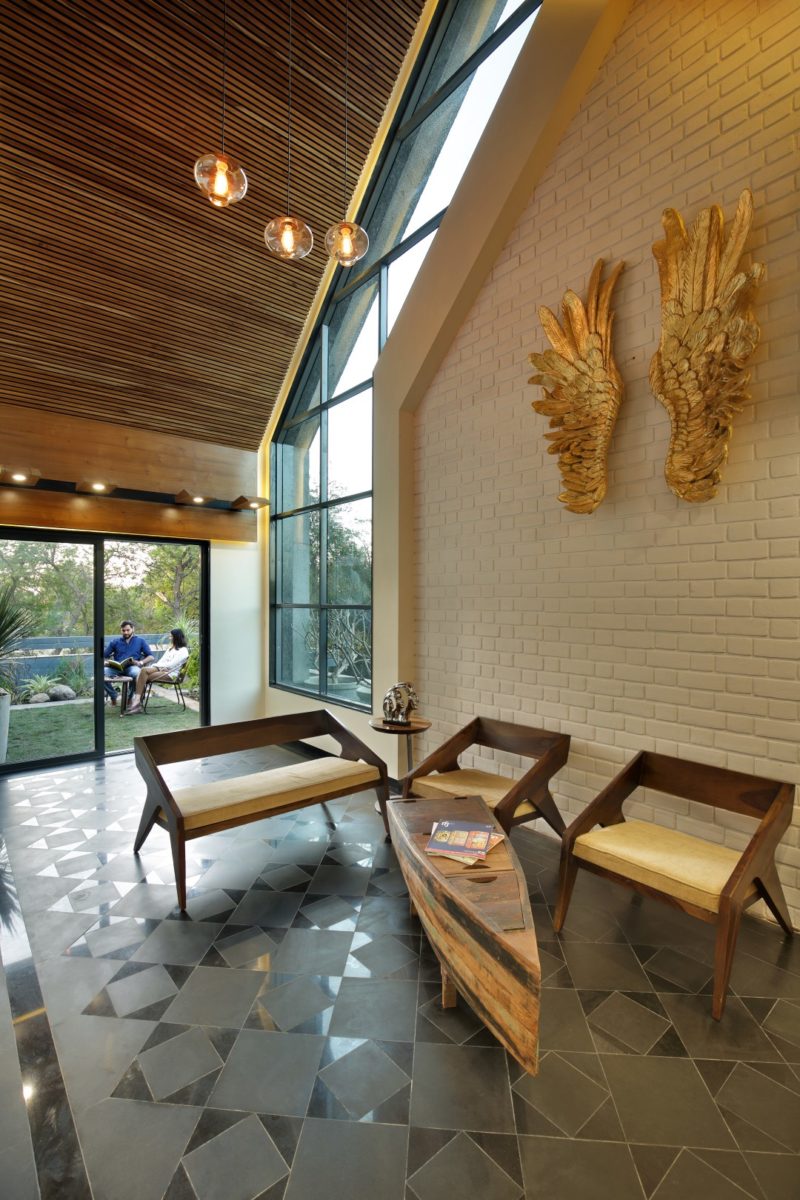 An Exposed Brick Front Elevation Gives the Villa an Evergreen Look ...