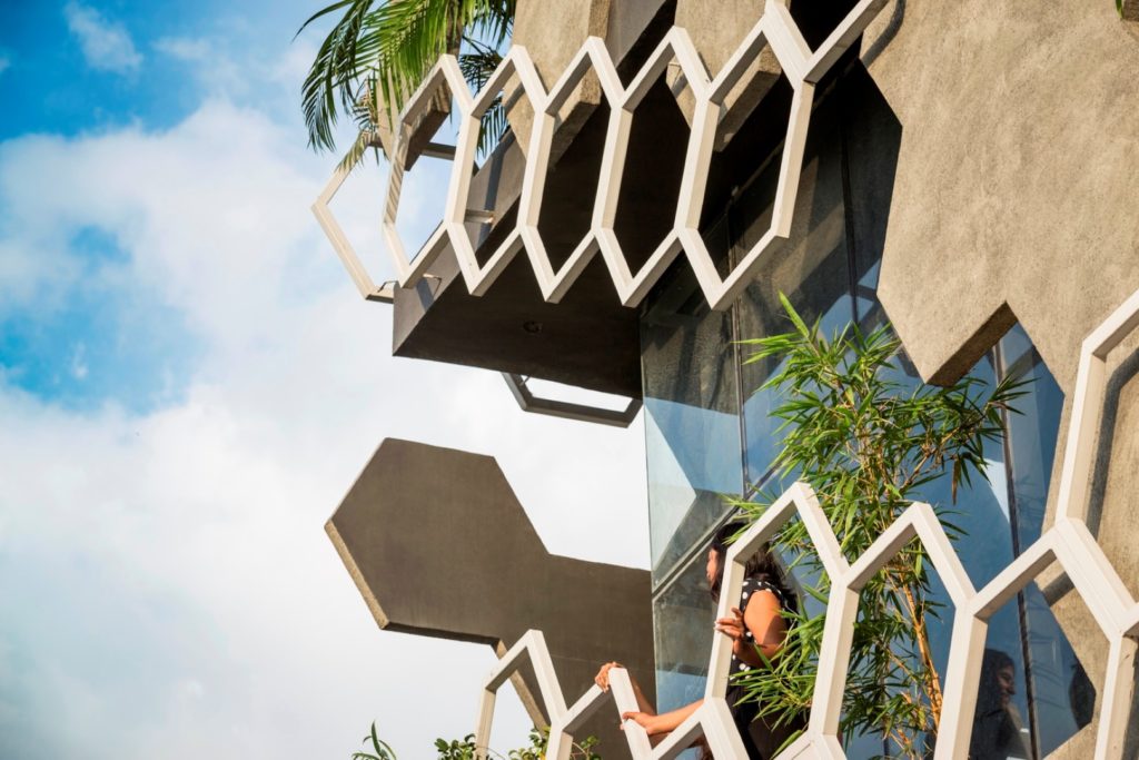 Hexagonal Facade Design Emerged as a Buffer of Stratifying Elements ...