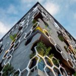 Hexagonal Facade Design Emerged as a Buffer of Stratifying Elements ...