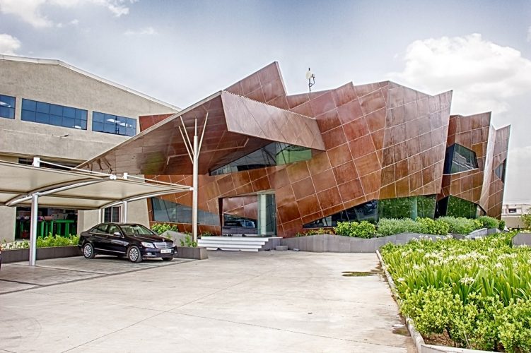 This Building’s Form And Surfaces Portray The Basic Properties Of Metal ...