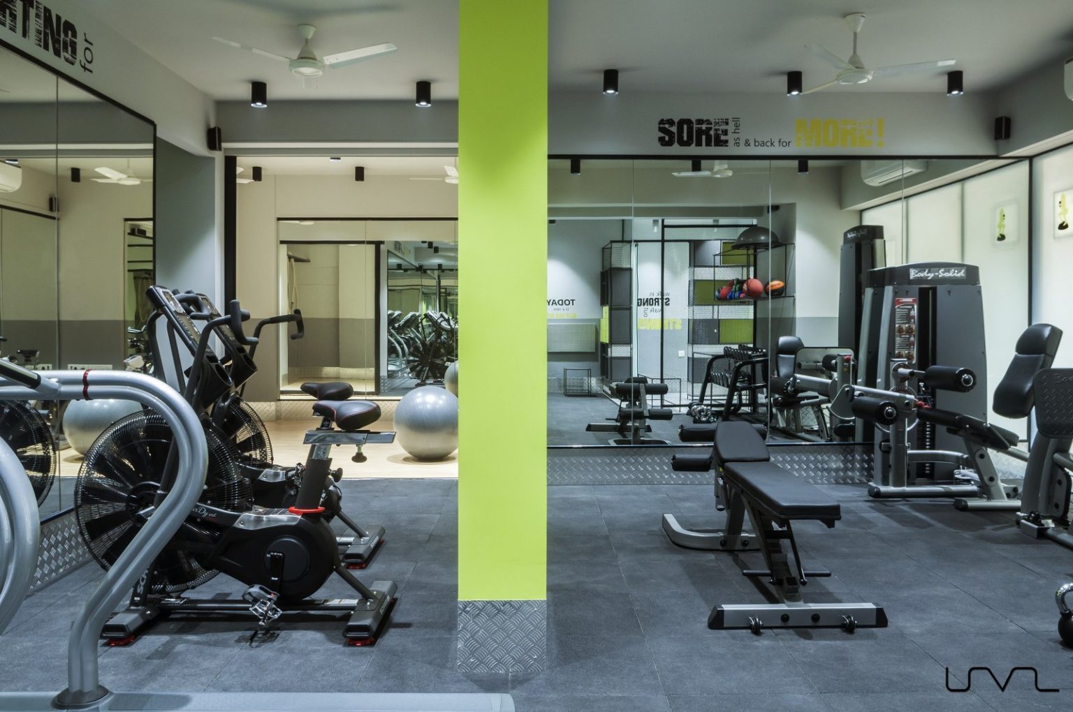 Gym Design With Bright Lime Green Highlighted In Neutral Surrounds ...