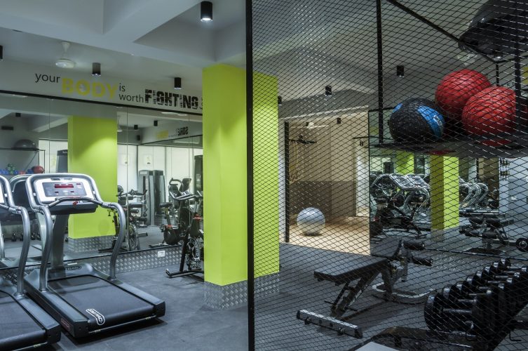 Gym Design With Bright Lime Green Highlighted In Neutral Surrounds ...
