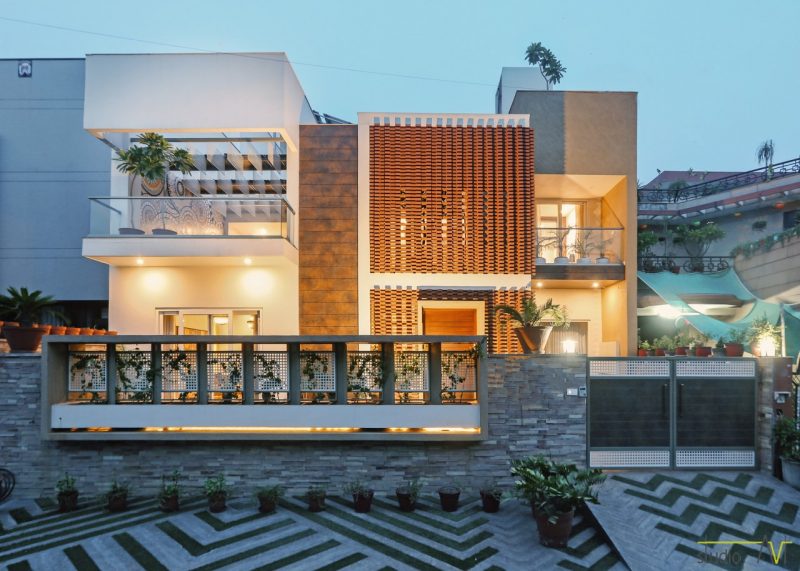 Facade With Staggered Rectangular Volumes That Greets With Warmth And ...