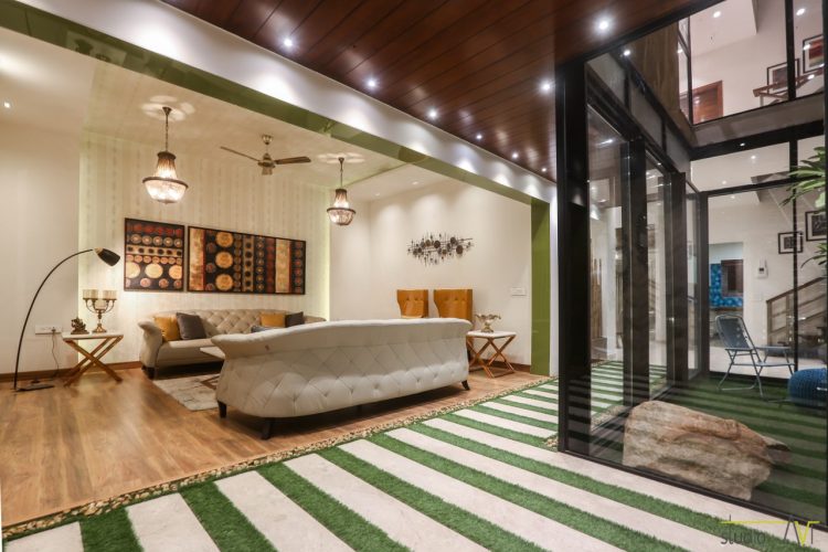 Facade With Staggered Rectangular Volumes That Greets With Warmth And ...