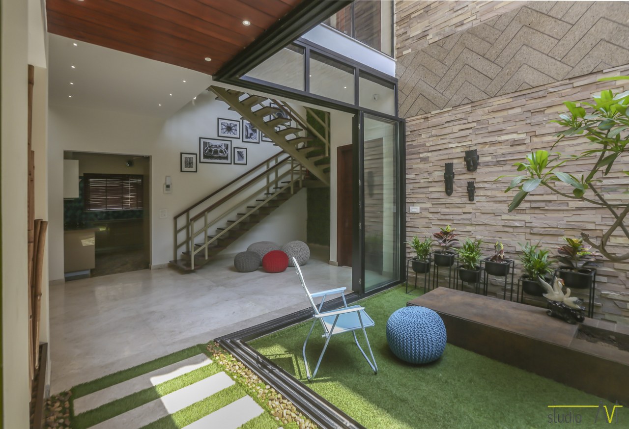 Facade With Staggered Rectangular Volumes That Greets With Warmth And ...