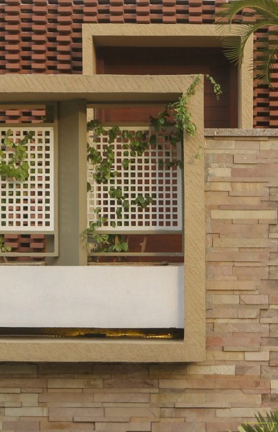 Facade With Staggered Rectangular Volumes That Greets With Warmth And ...