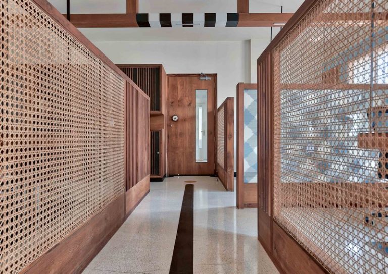 The executive workspaces have partitions made of reclaimed wood and ...