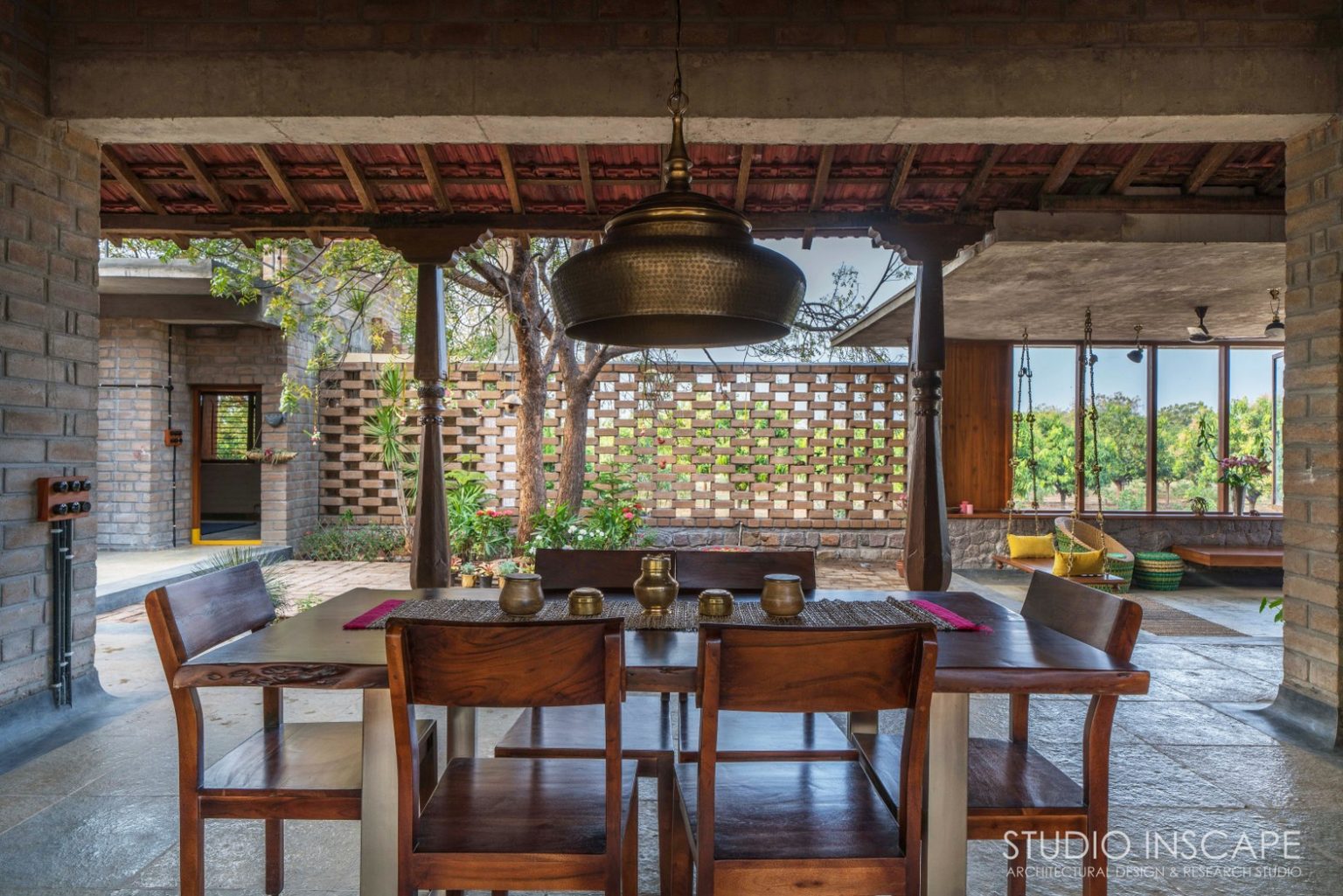 Earthy Farmhouse Design Weaved Around A Traditional Courtyard | Studio ...