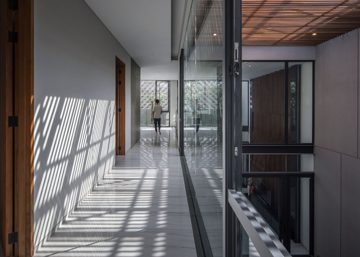 Double-Height Courtyard Providing Experiential Environment At RR House ...