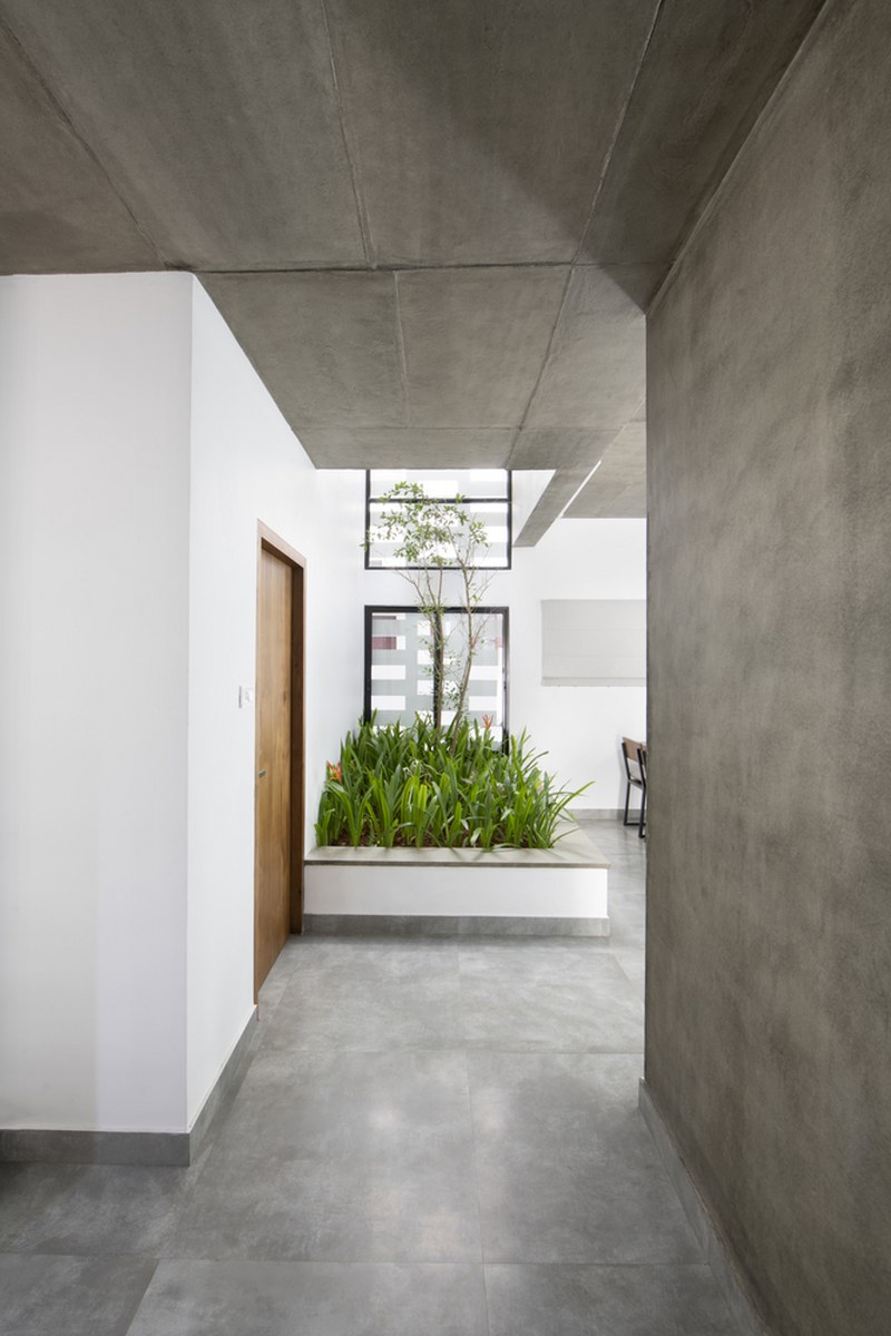White Skube House: A Minimalist Approach In Making A Skewed Home ...