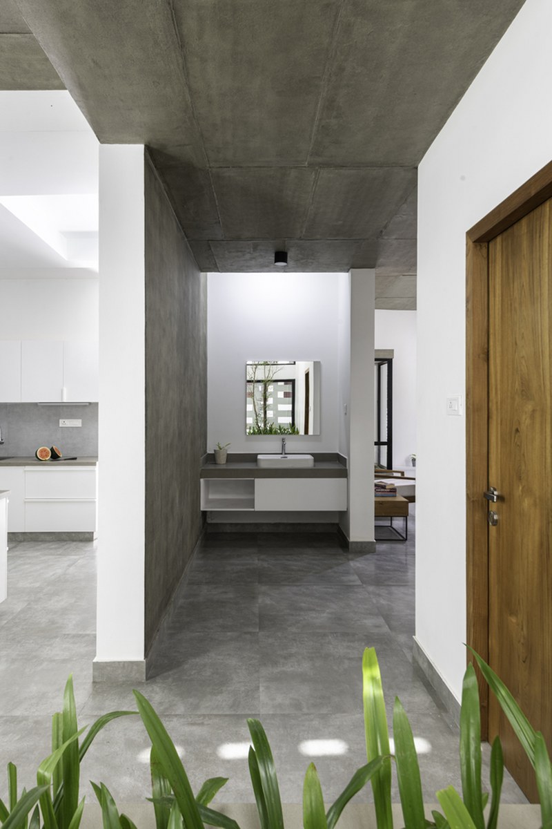 White Skube House: A Minimalist Approach In Making A Skewed Home ...