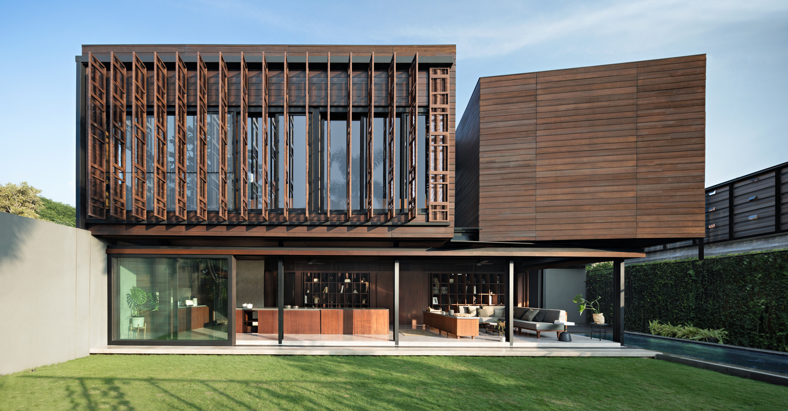 A Weekend Home Designed with an Inward Orientation of Space to Create ...