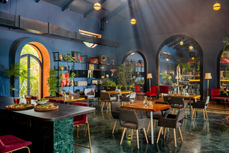 Echoes of Vivid Palette and Arched Openings give way to this Modernist ...