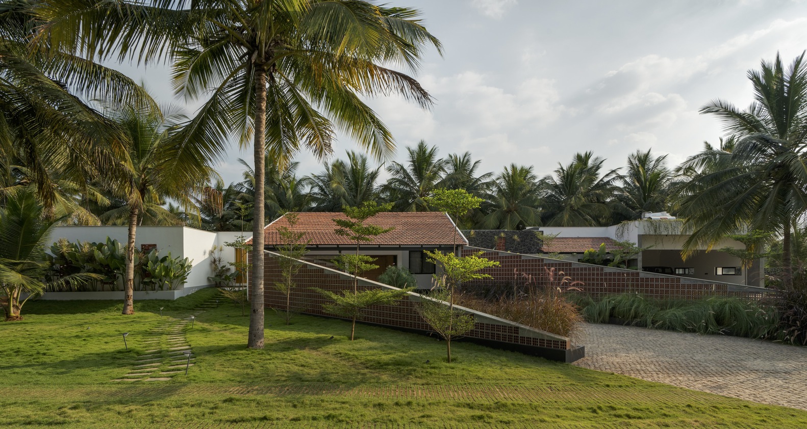 The Inclined Porotherm Block Jali Wall is an Entrance Portal ...