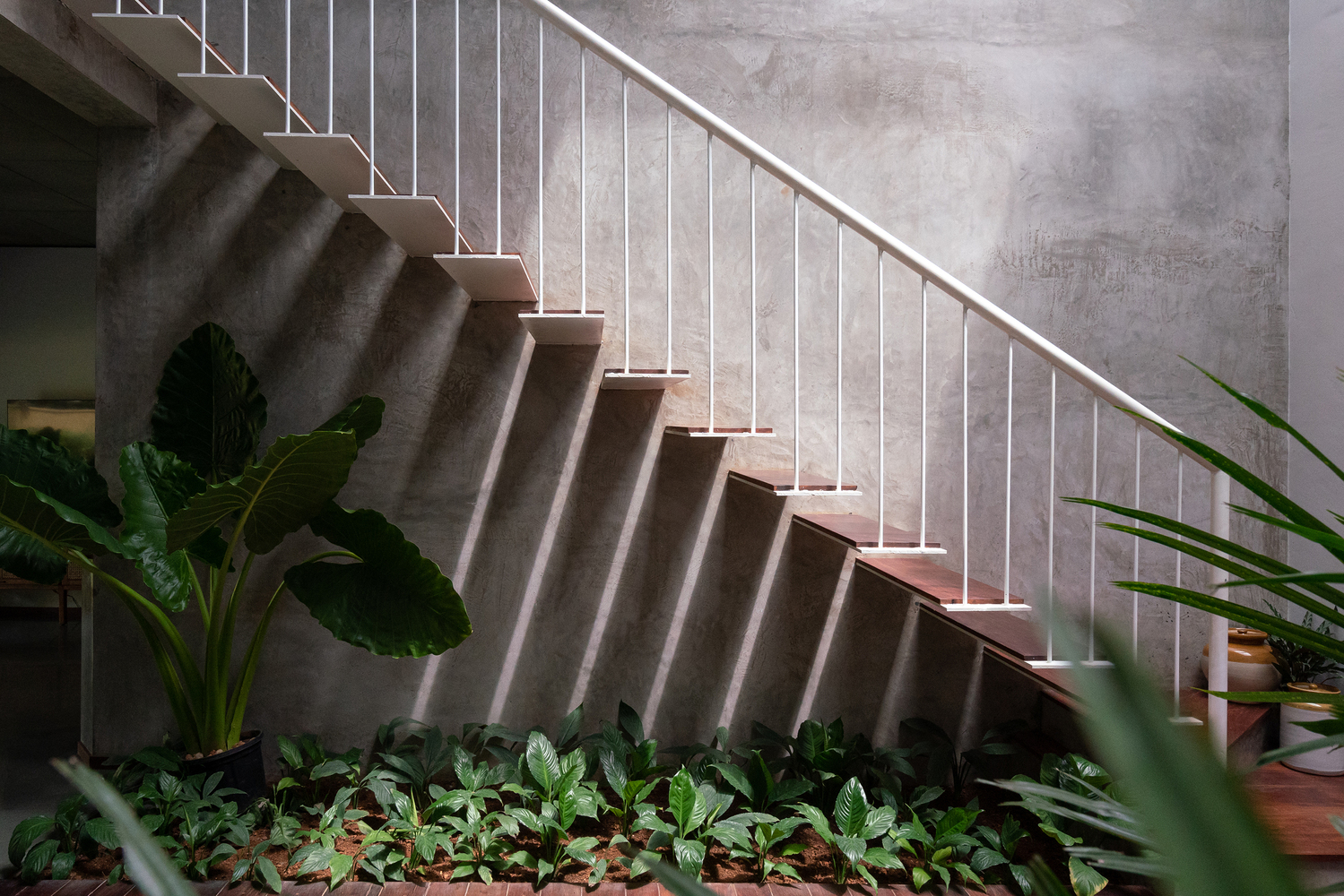 The Residence Exudes Unique Character With its Earthy Tones and Rat ...