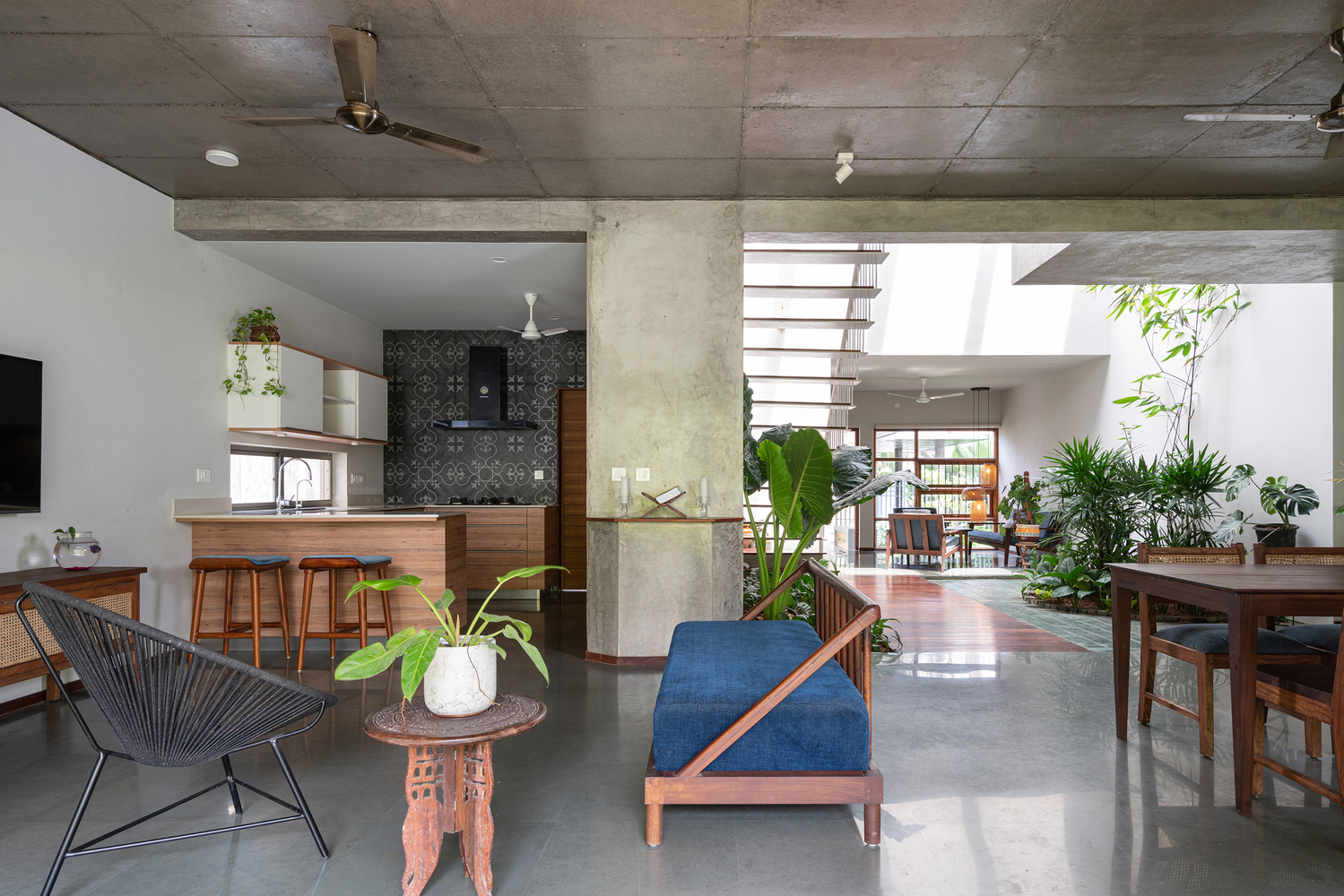 The Residence Exudes Unique Character With its Earthy Tones and Rat ...