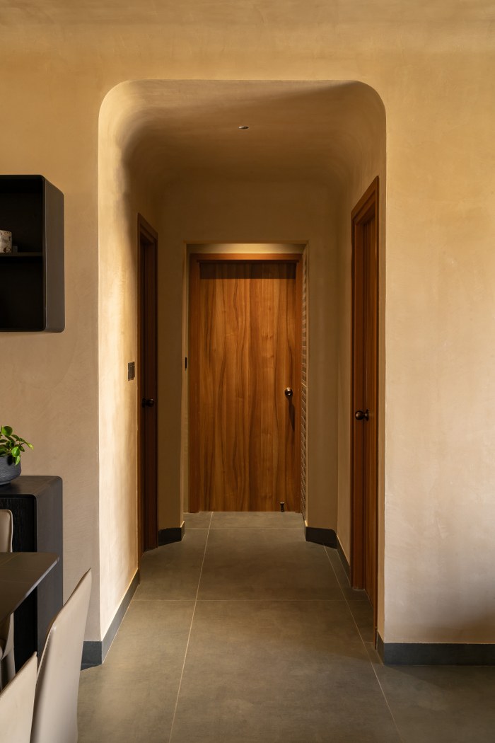 The Interior Of This Modern Indian House Design Has A Warm Earthy ...