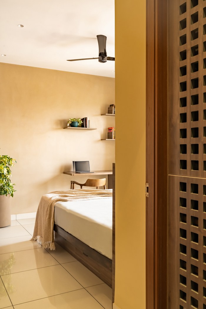 The Interior Of This Modern Indian House Design Has A Warm Earthy ...