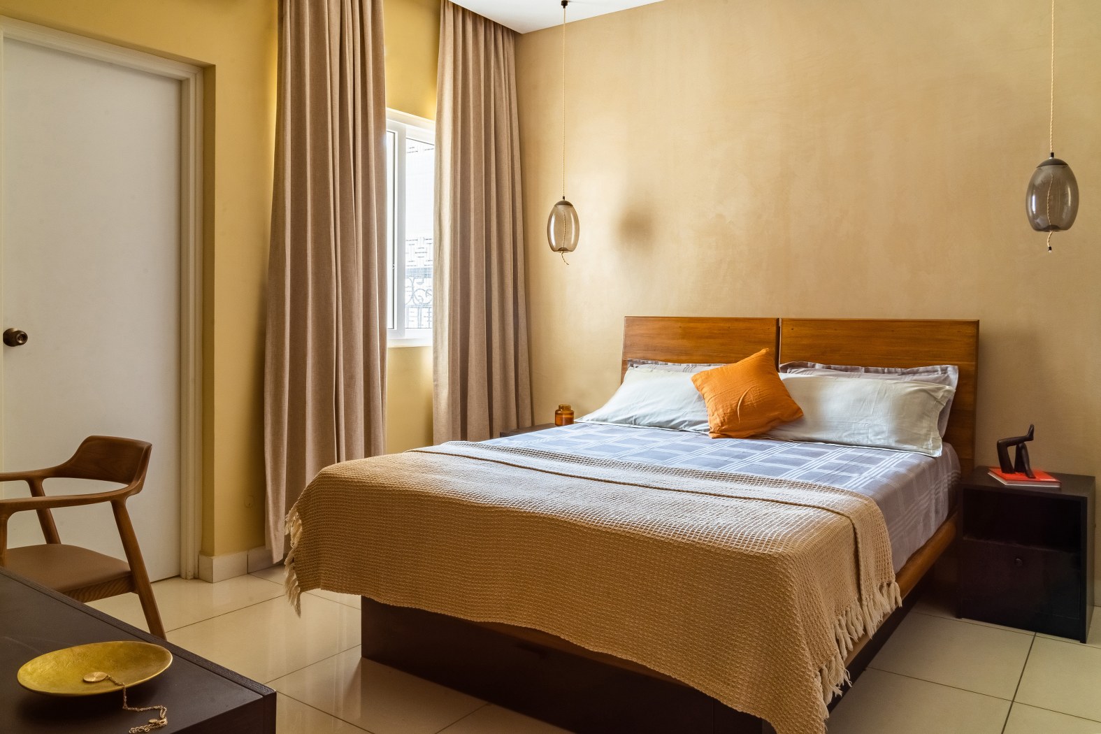 The Interior Of This Modern Indian House Design Has A Warm Earthy ...