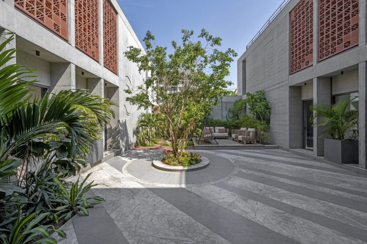 Home with Brick and Concrete Wall has an Open-to-Sky Courtyard ...