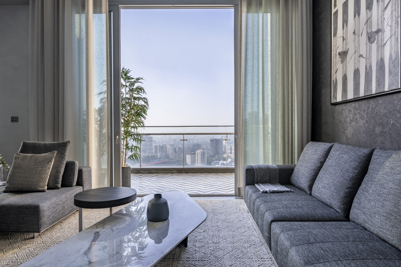This Grey Abode On This High Rise Building Has Only The Bare ...