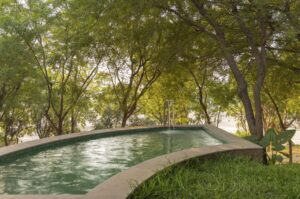 The Goal of this Riverbank House is to Harmonize with their ...