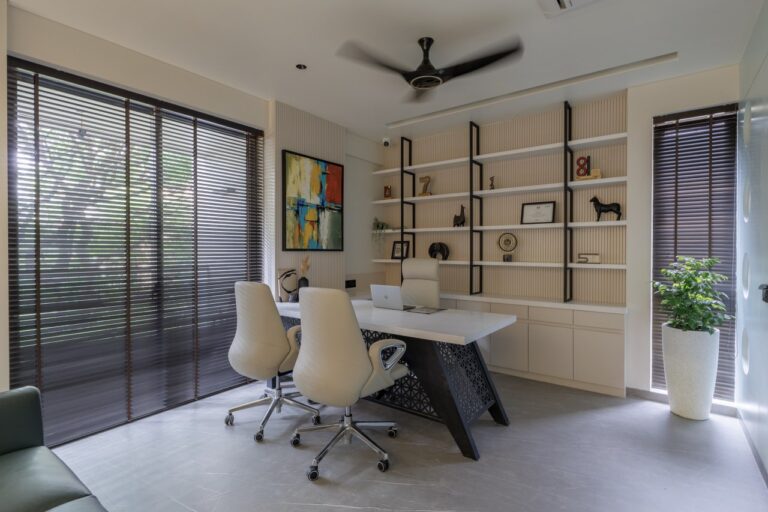 This Neutral White Office Fosters a Clean and Professional Atmosphere ...