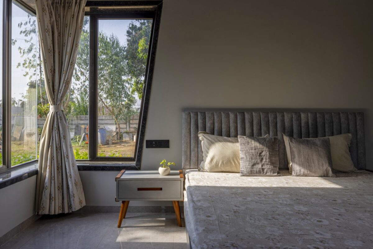 A Home in Baroda is Lost in a Sea of Dense Green | Shreesh Design ...