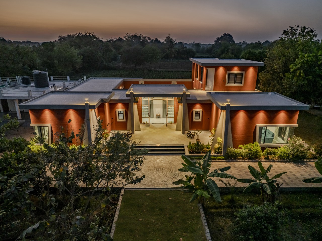 A Home in Baroda is Lost in a Sea of Dense Green | Shreesh Design Studio LLP and Avastha Studios