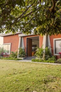 A Home in Baroda is Lost in a Sea of Dense Green | Shreesh Design ...