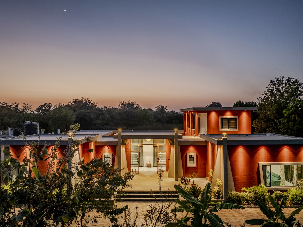 A Home in Baroda is Lost in a Sea of Dense Green | Shreesh Design ...