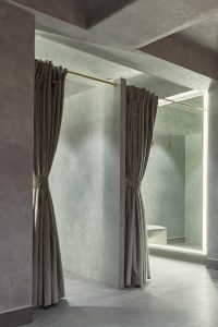 This Cement Texture Wall Office is a Blend of Minimalism and Luxury | Olive