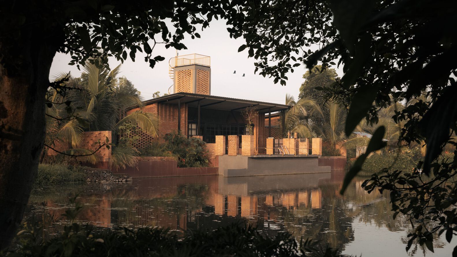This house by the lake is Inspired by Wada Architecture | Studio Prakriya