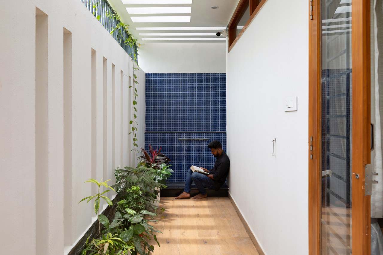 This Facade Design House Creates a Pierced Plane of Open Space Within ...