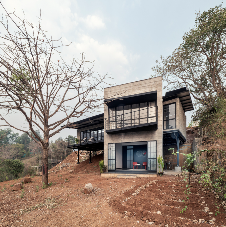 This Slope House Is A Functional Retreat Amidst Nature | Red Brick Studio