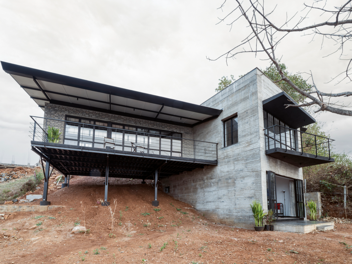 This Slope House Is A Functional Retreat Amidst Nature | Red Brick Studio