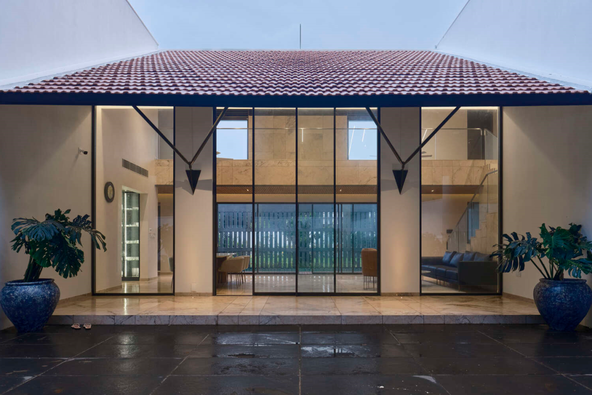 This Elevated House Design Embraces The Natural Contours of ...