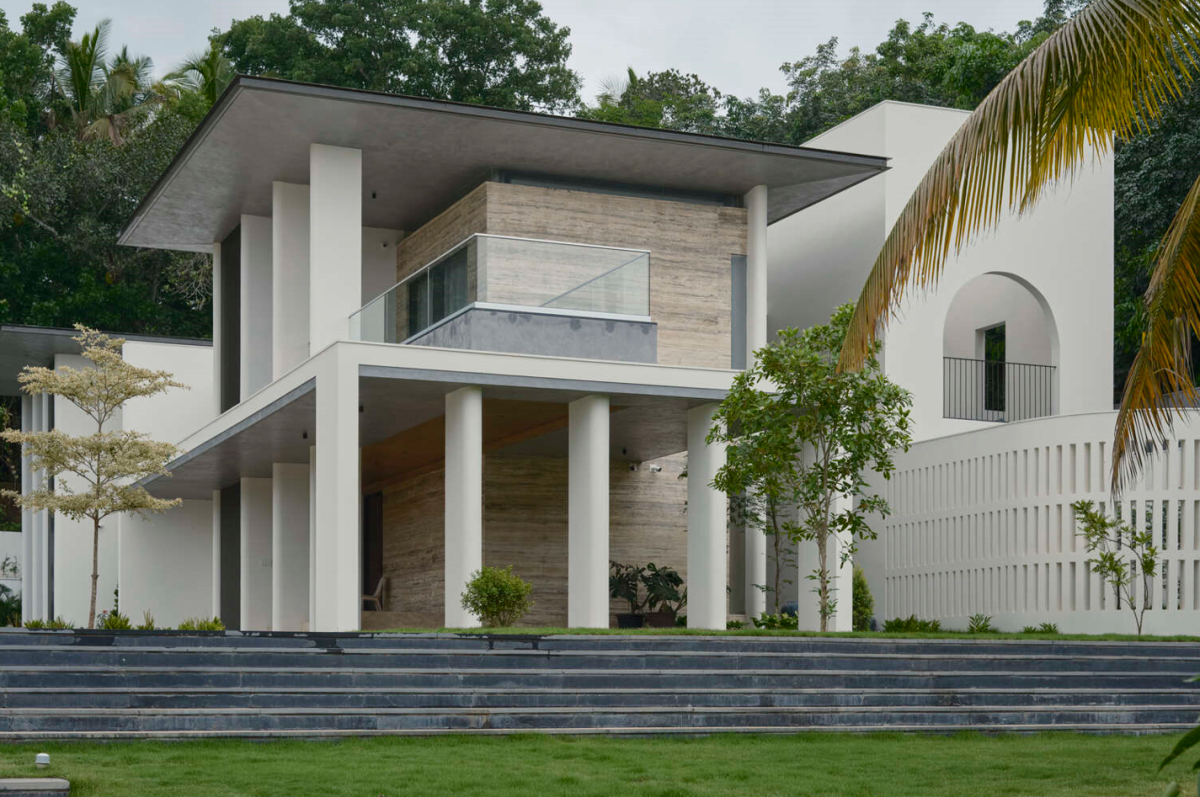 This Elevated House Design Embraces The Natural Contours of ...