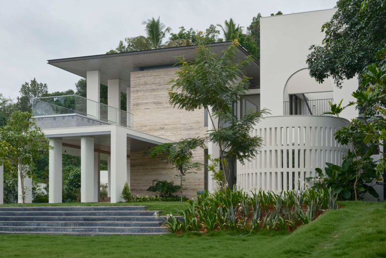 This Elevated House Design Embraces The Natural Contours of ...