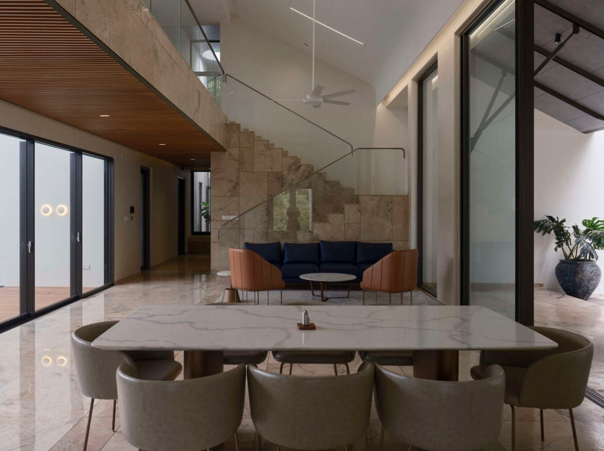 This Elevated House Design Embraces The Natural Contours of ...