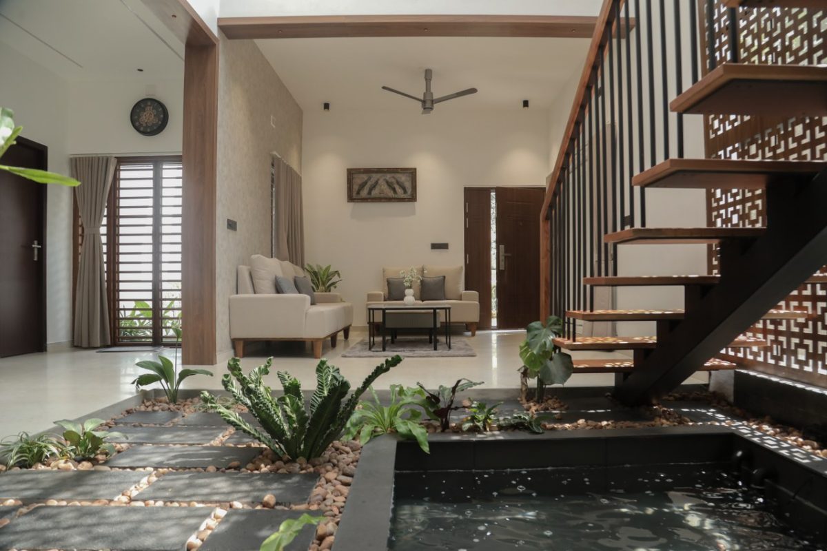 Silhouette House's Sloping Roof Design Blends Modern Living & Nature ...
