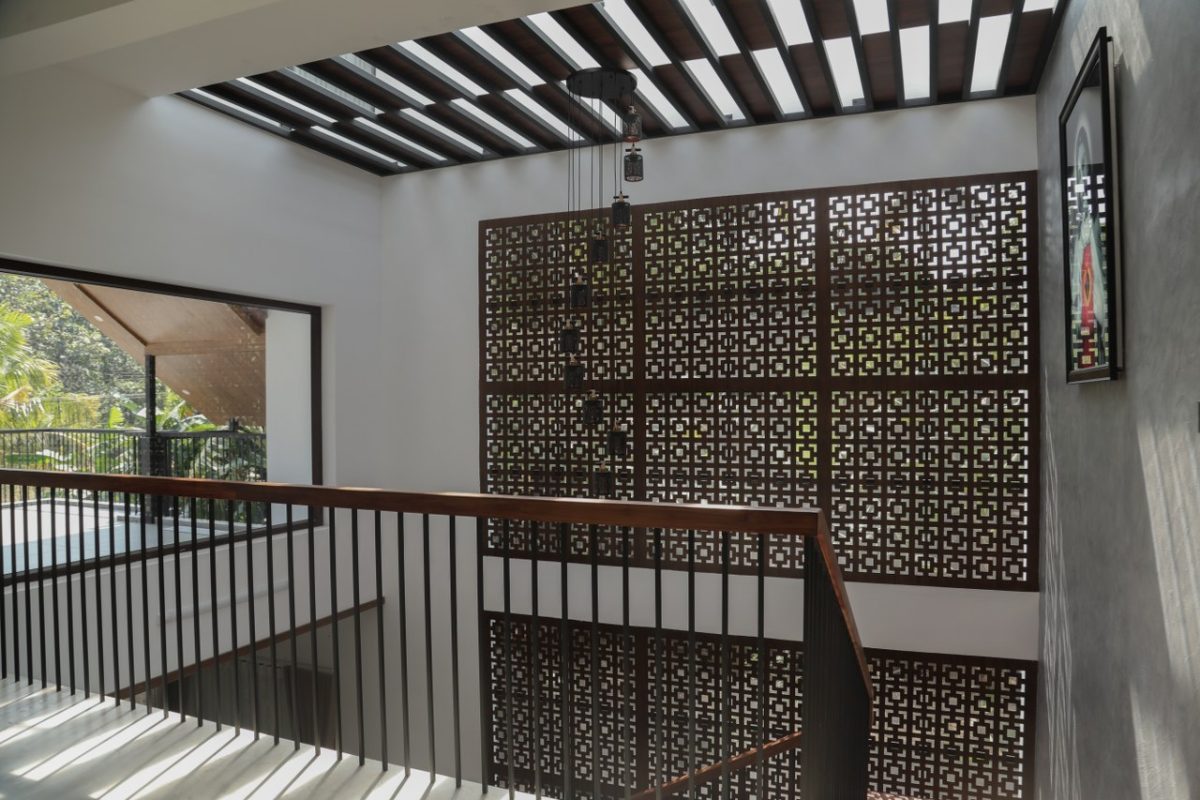 Silhouette House's Sloping Roof Design Blends Modern Living & Nature ...