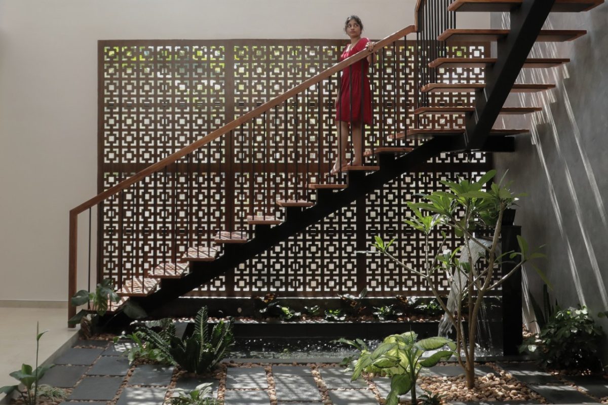 Silhouette House's Sloping Roof Design Blends Modern Living & Nature ...