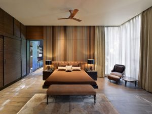 This High Ceiling House in Sushant Lok Seamlessly Blends With Nature at ...