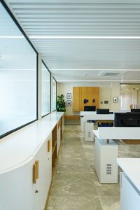 This Office Interior Design Influences Workspace Energy Through ...