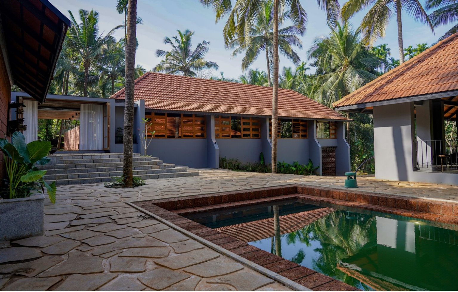 This L-shaped Home Design Is A Blend Of Retreat Tradition And Melody ...
