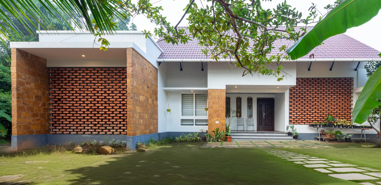 This Brick Home Design Takes A Natural Turn with Holed Breathable Walls | amAC Architects